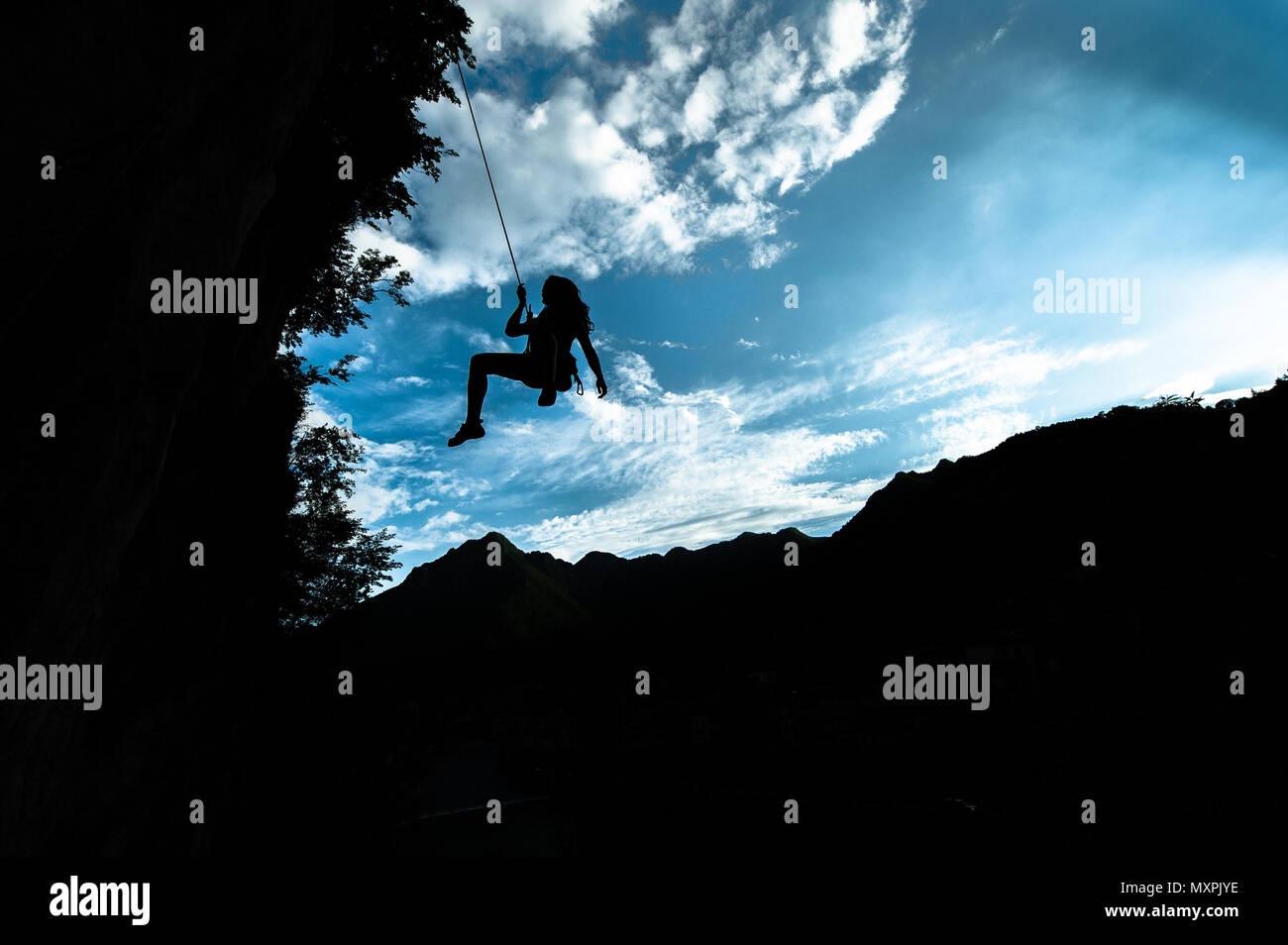 Silhouette climbing rope hi-res stock photography and images - Alamy
