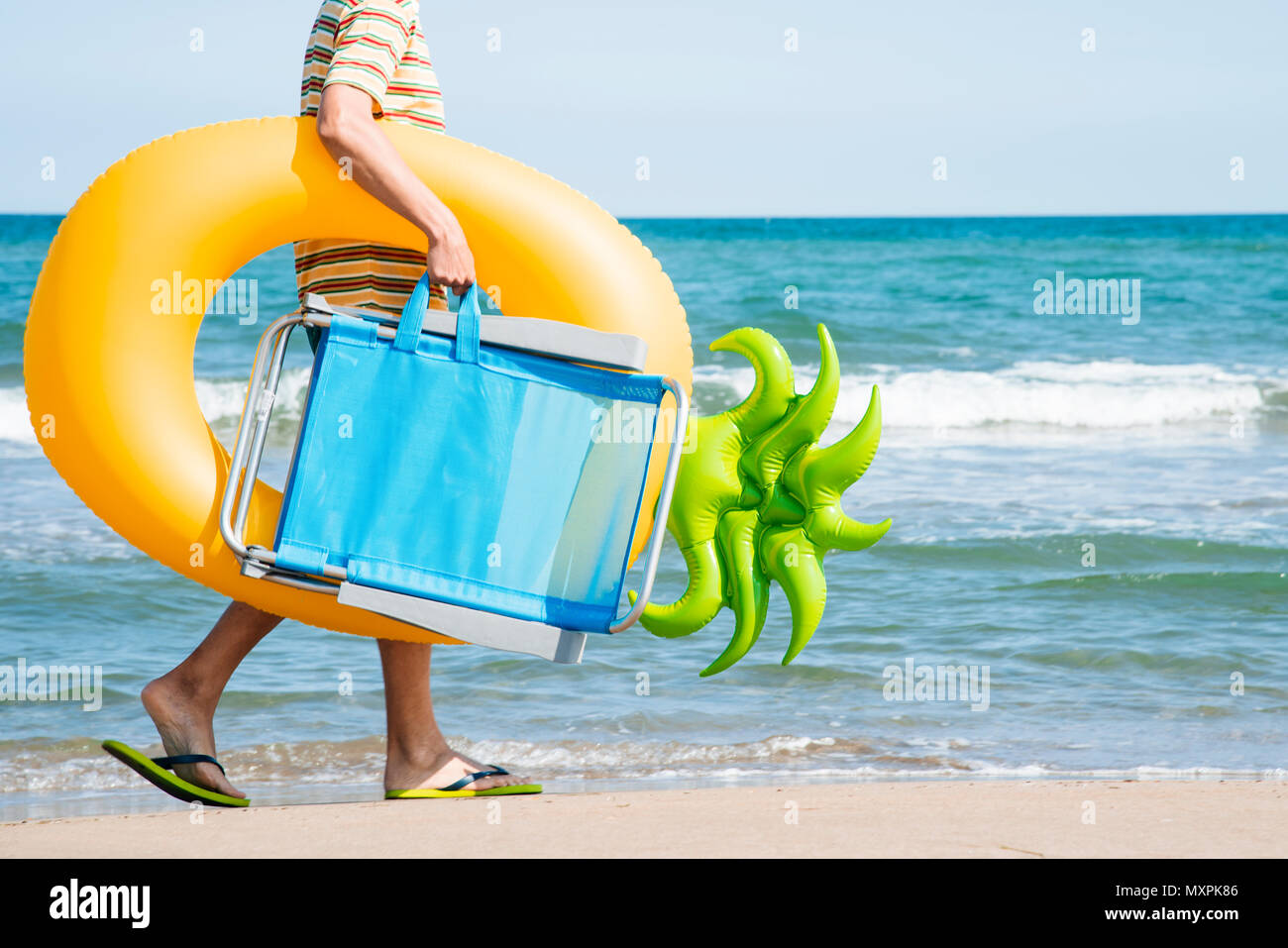 Man deck chair beach hi-res stock photography and images - Alamy