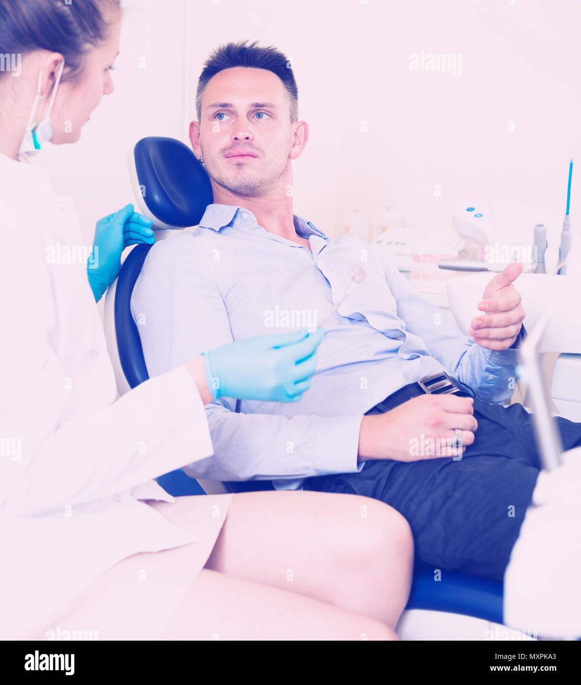 Adult man is taking advice from doctor in the hospital Stock Photo - Alamy