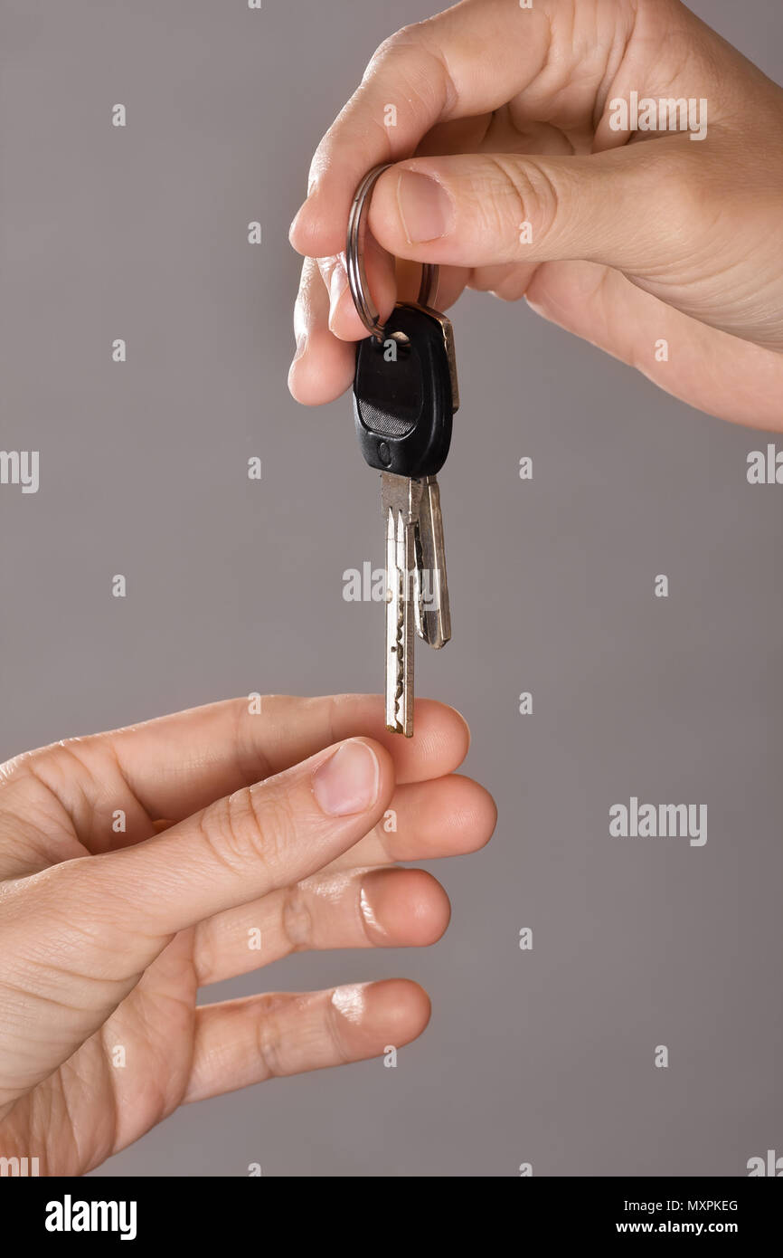 Handing hi-res stock photography and images - Alamy