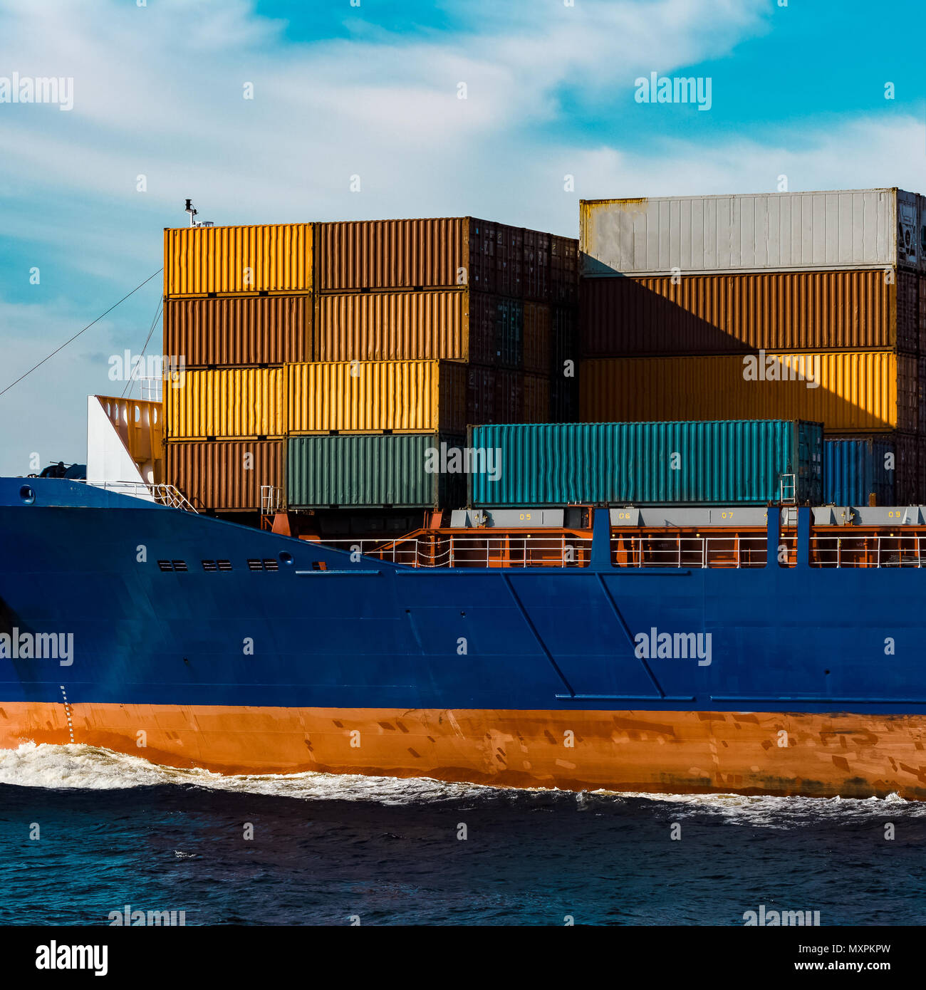 Blue container ship in travel. Logistics and freight industry Stock ...