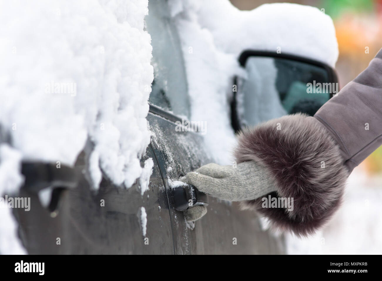 Hand in the snow hi-res stock photography and images - Alamy