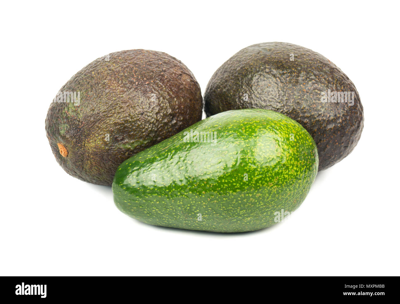 Three fresh fruit avocado on white background Stock Photo - Alamy
