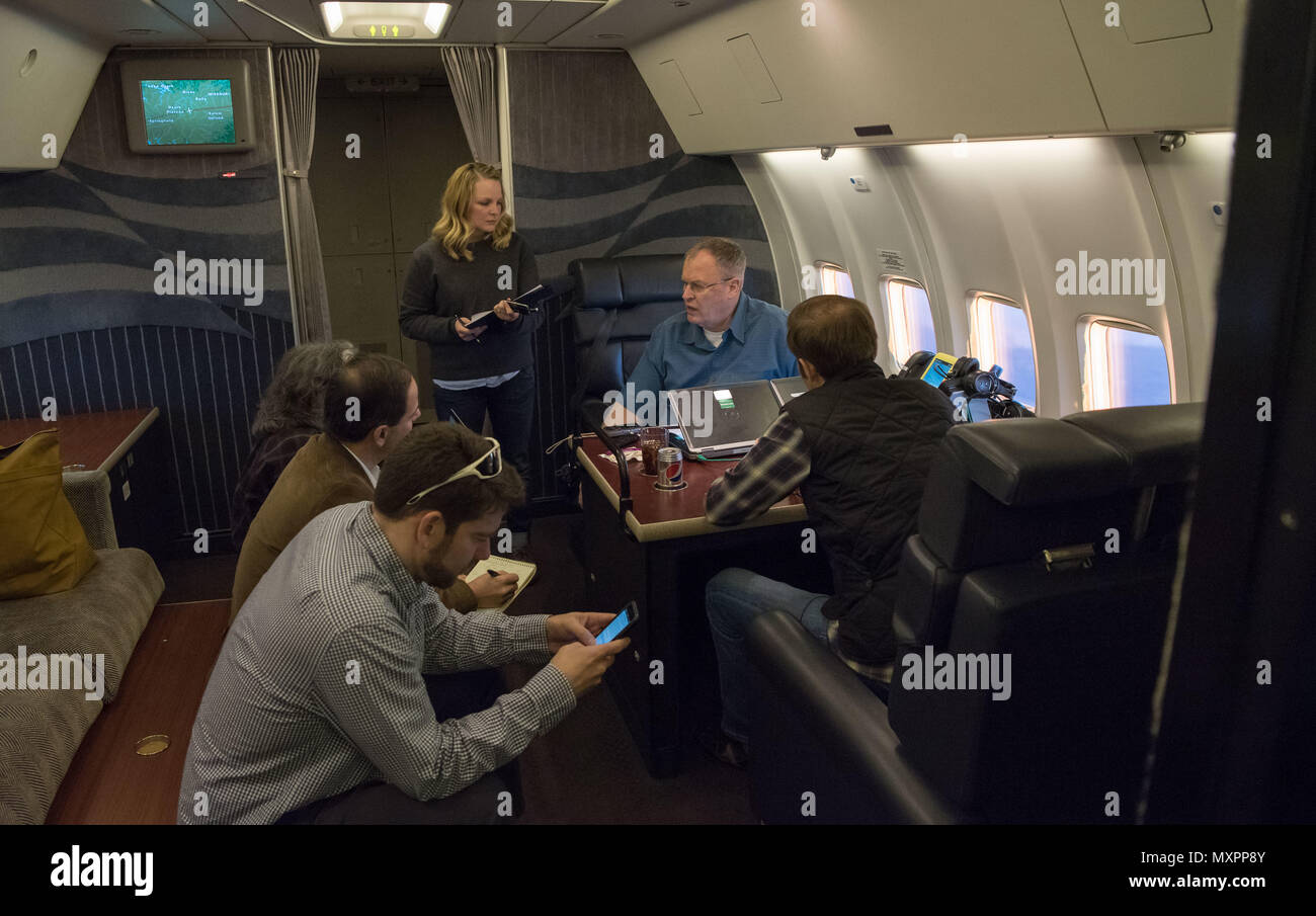 Deputy Defense Secretary Bob Work speaks with the press during a flight ...