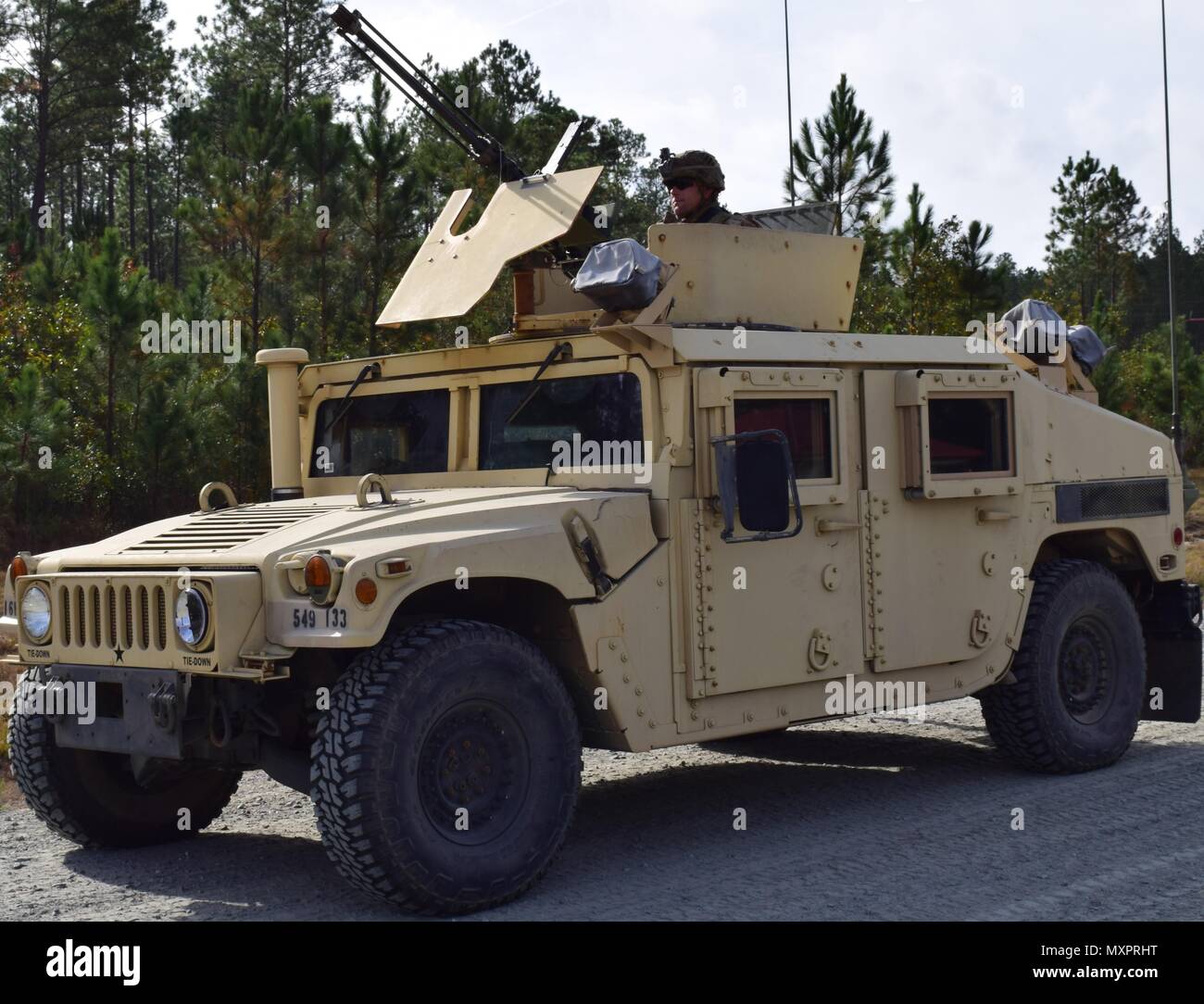 Soldiers from 3rd Brigade Support Battalion prepare to fire the .50 ...