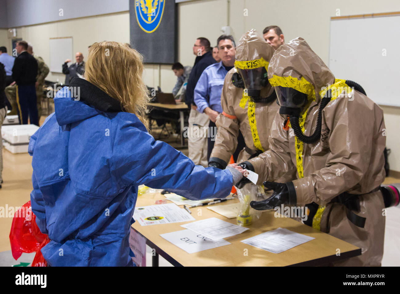 Firefighters, assigned to New York Fire Department HAZMAT Team, screen ...