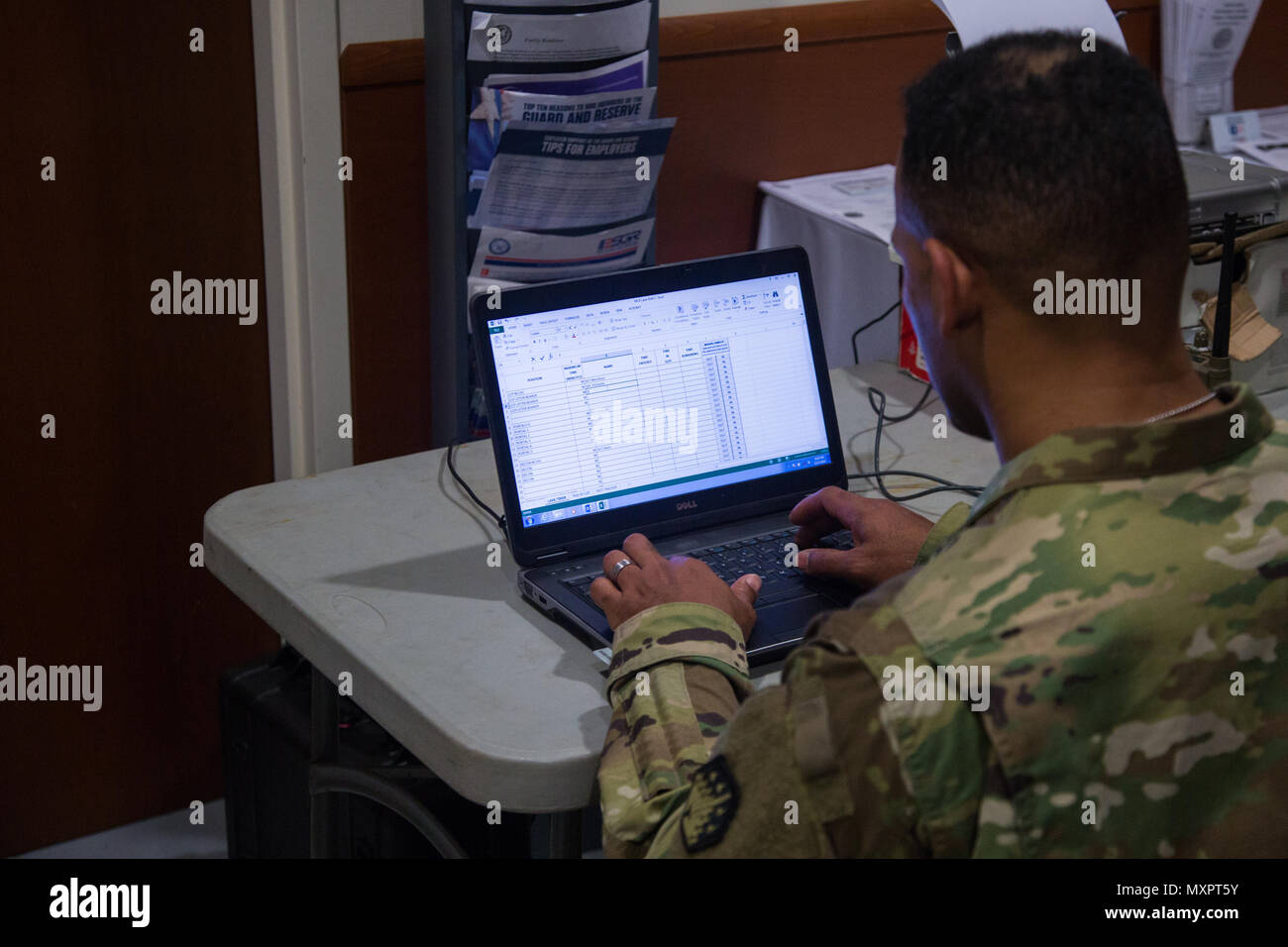 U.S. Army Sgt. First Class Harlintony Austin, assigned to 59th CBRN ...
