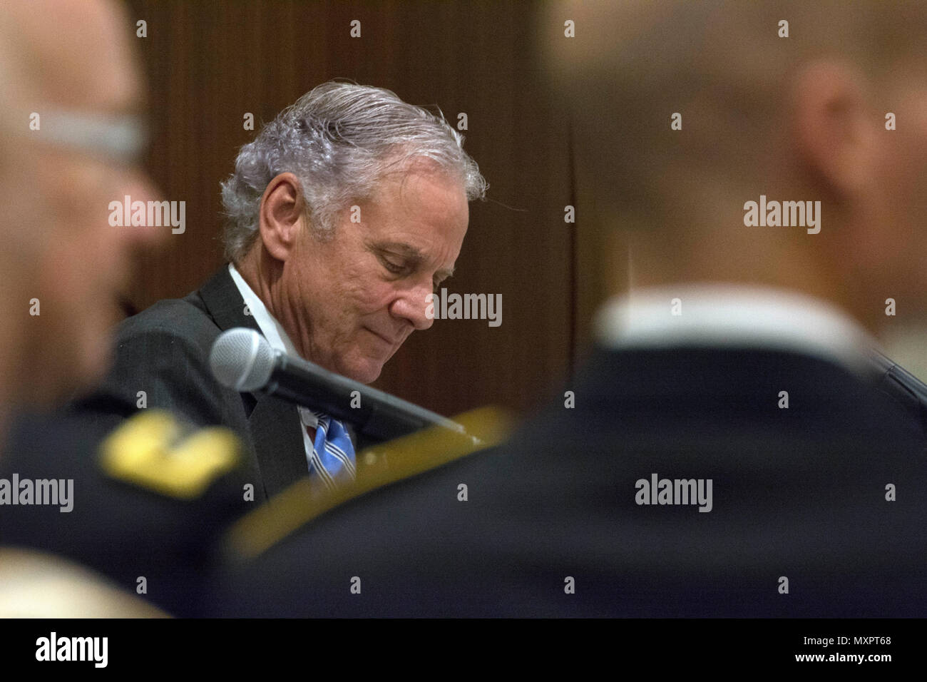 Henry D. McMaster, Lt. Governor of South Carolina, takes notes during ...