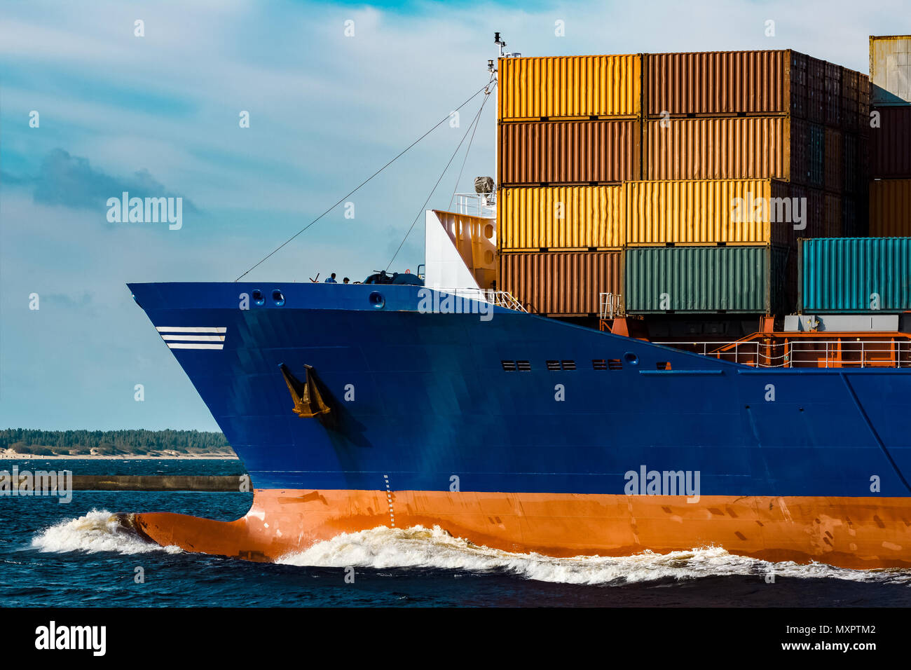 Blue container ship in travel. Logistics and freight industry Stock ...