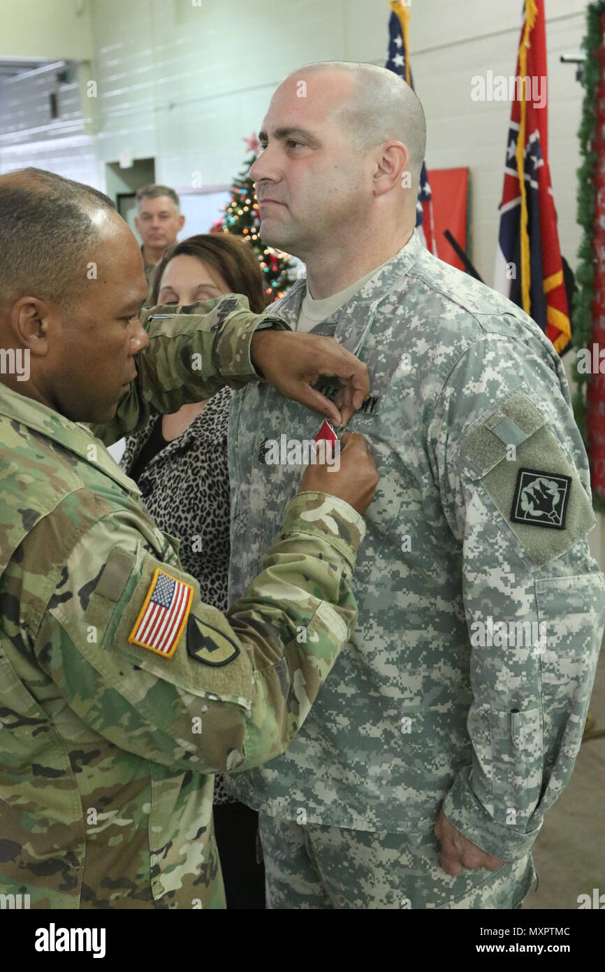 Sgt. Maj. Robert Goldsmith is awarded the Legion of Merit medal from ...