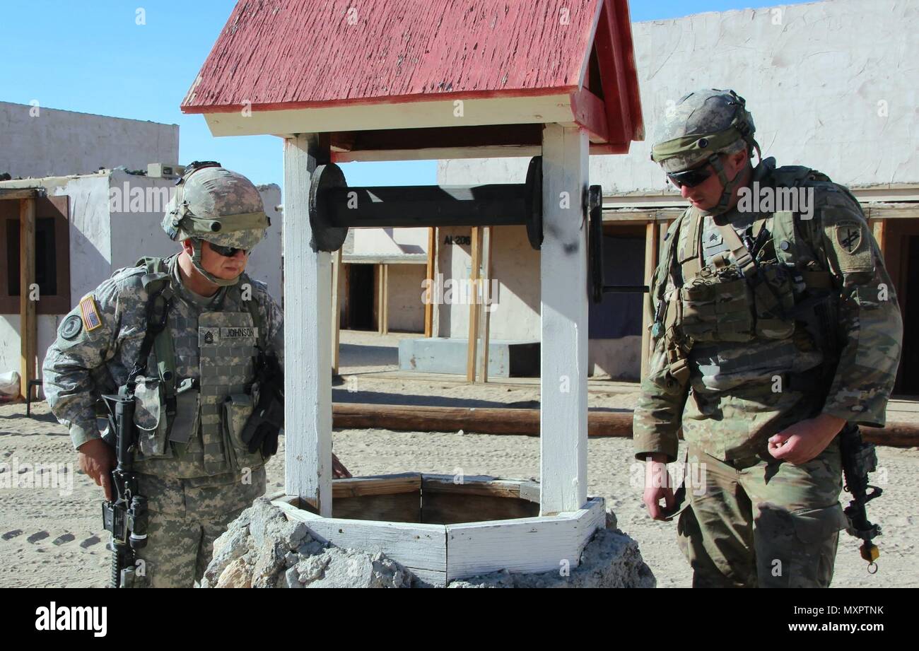 Delta Company first sergeant, Sgt. 1st Class Vincent Johnson (left ...