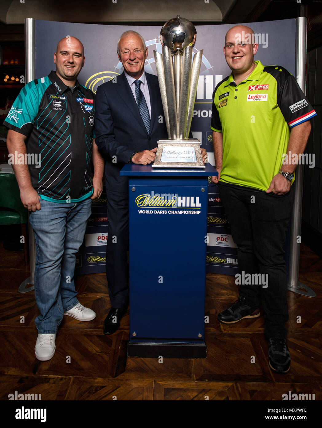 Current William Hill World Champion Rob Cross (left), chairman of ...