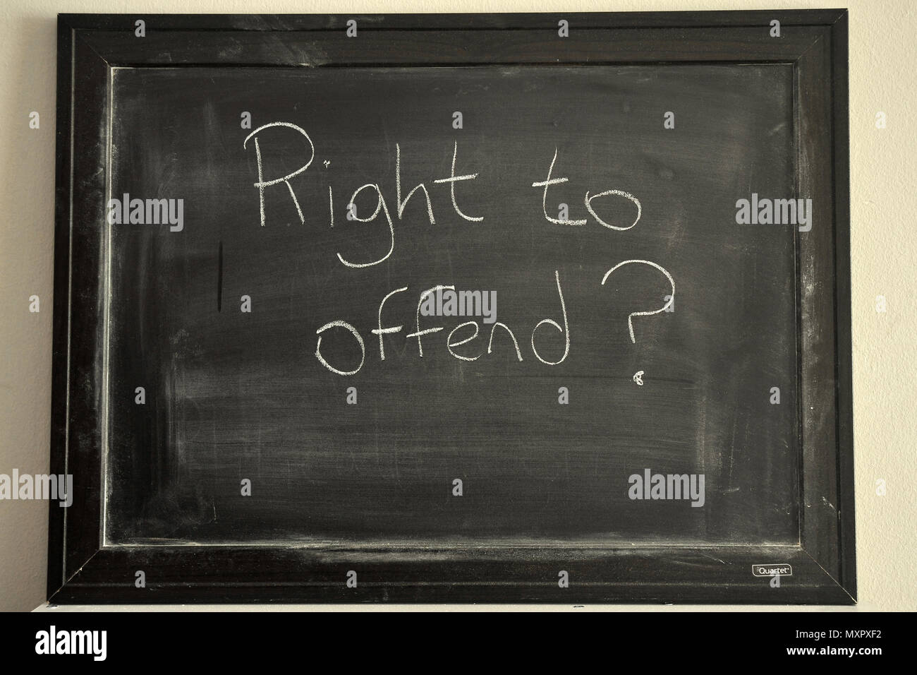 Right to offend written in white chalk on a blackboard Stock Photo - Alamy