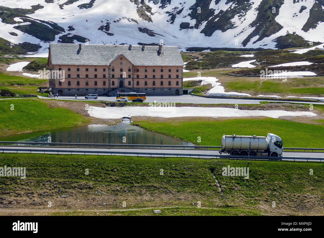 Simplon Hospitz yellow post bus and snowy weather in the mountains on ...