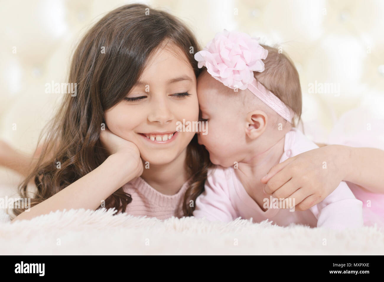 two sisters playing Stock Photo - Alamy