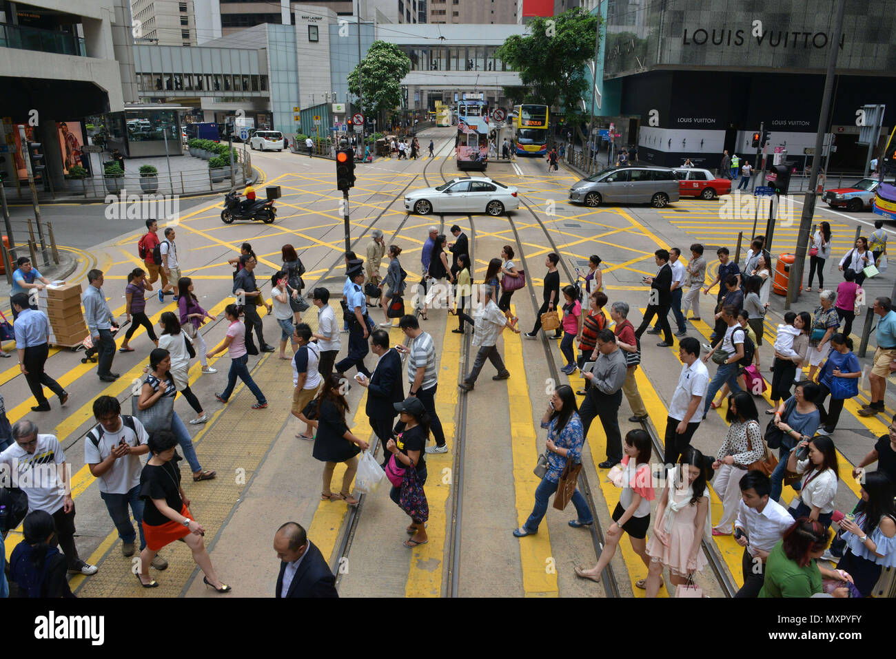 Hong Kong. Everyday life. Street scene. Crow of people walking on a ...