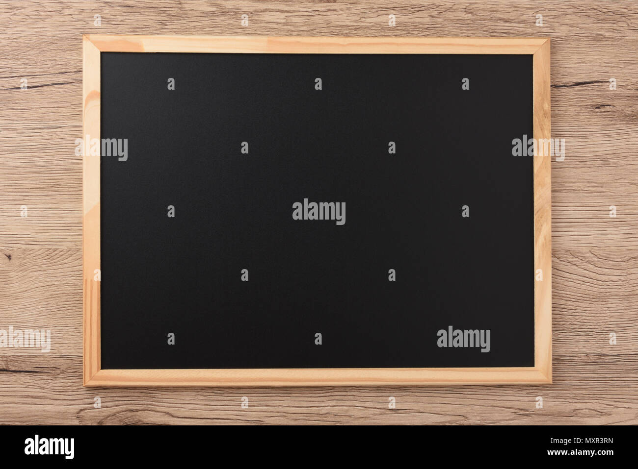 Blackboard on wooden floor,Blank space for text input Stock Photo - Alamy