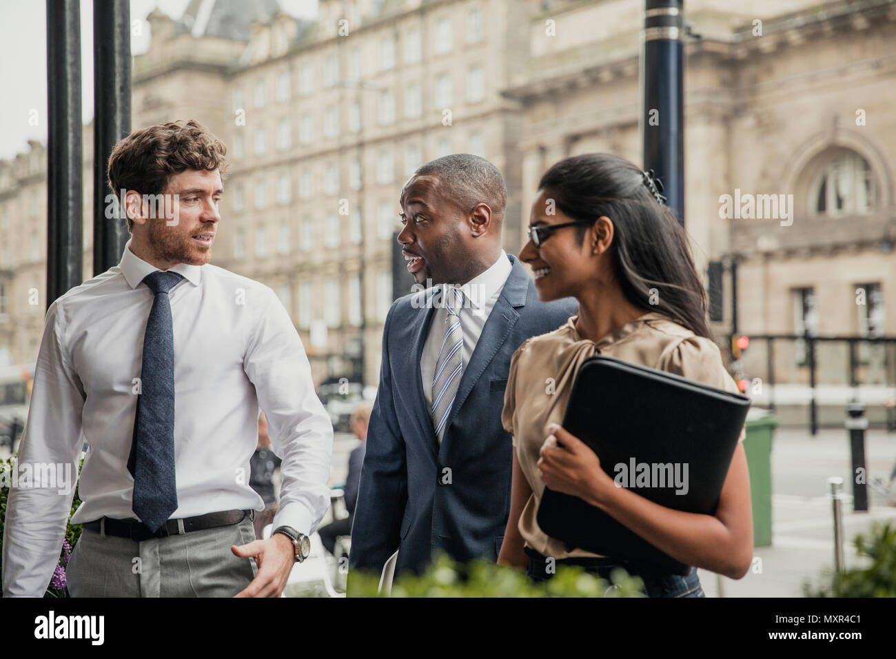 Business People Walking Side View
