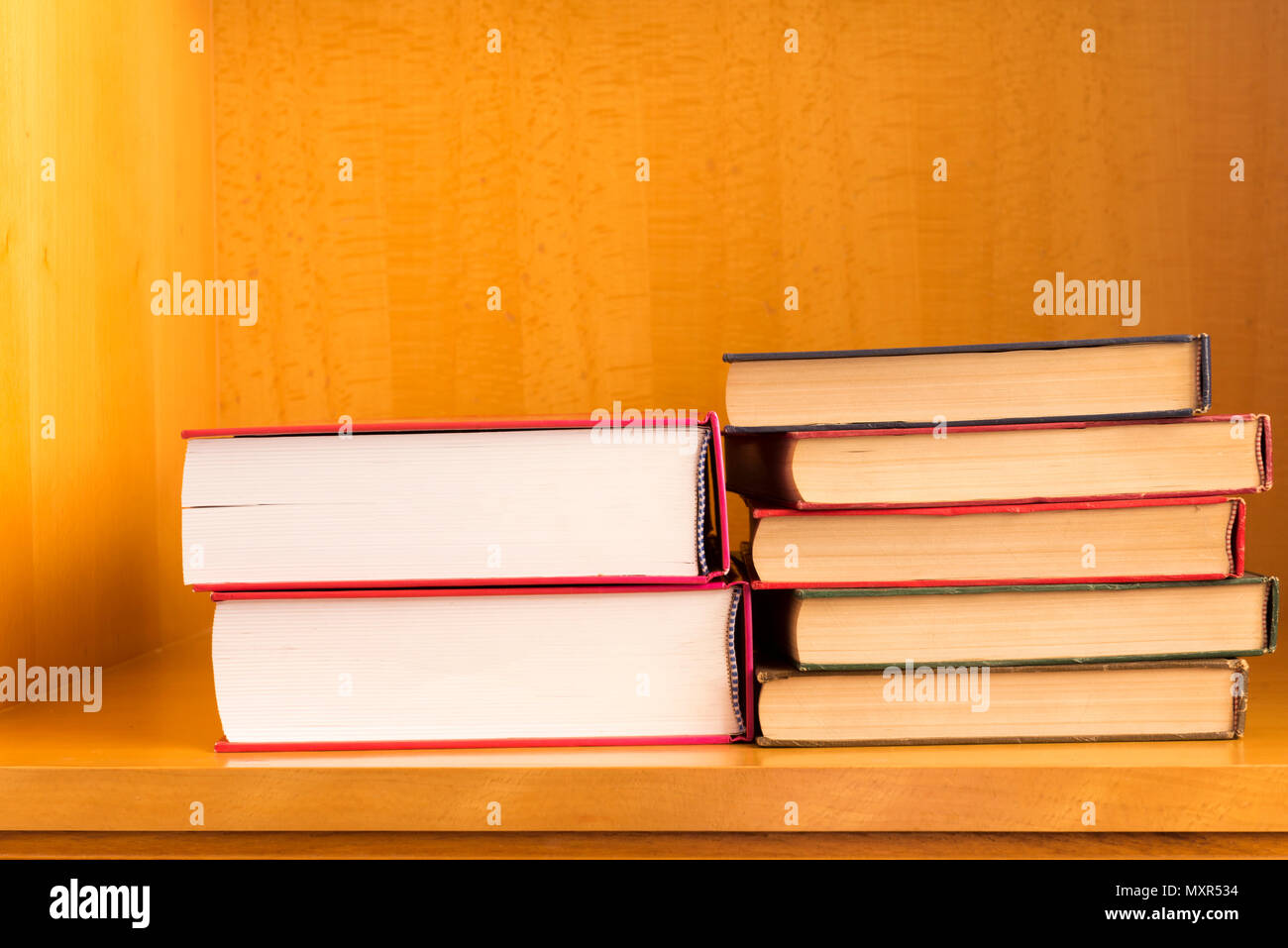 Book on the table in the classroom Stock Photo - Alamy