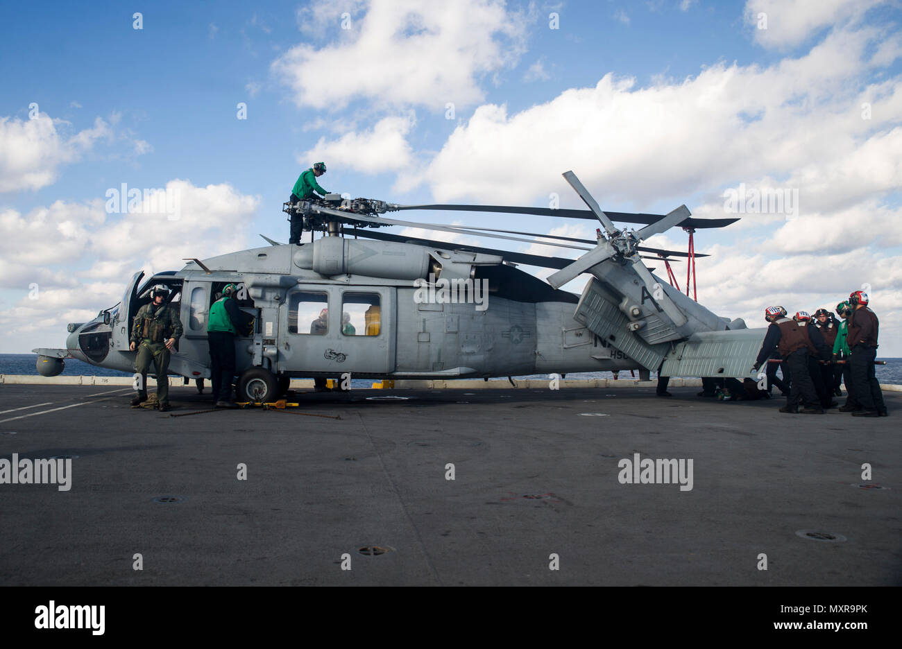 161202-N-YB023-031 ATLANTIC OCEAN (Dec. 2, 2016) Sailors from ...