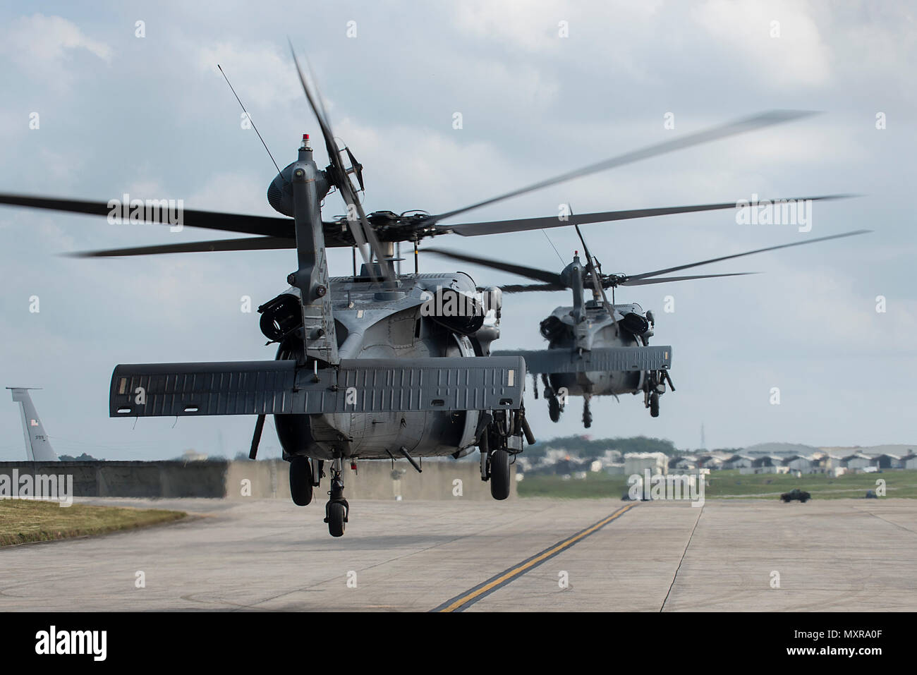 U.S. Air Force HH-60G Pave Hawks from the 33rd Rescue Squadron take off ...
