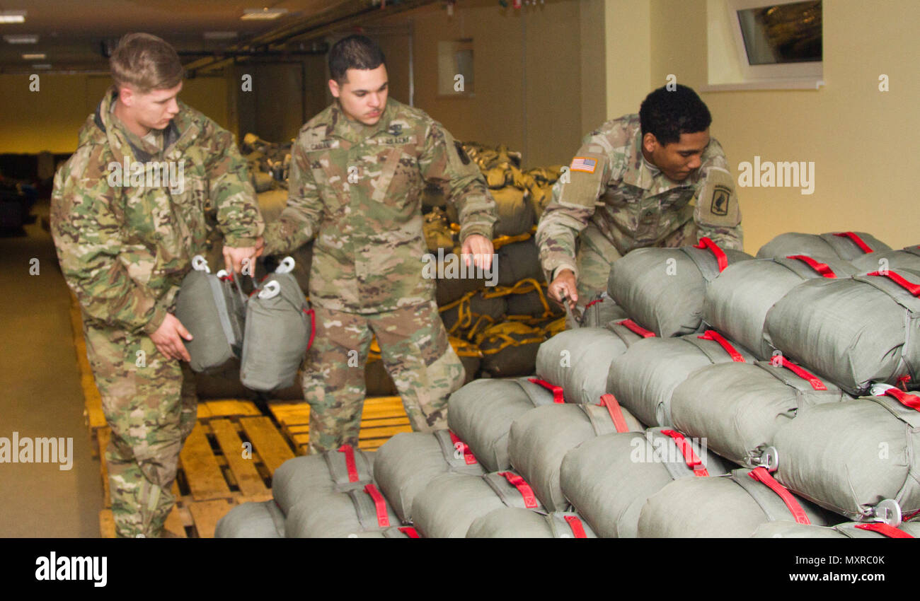 U.S. Army parachute riggers assigned to 601st Quartermaster Company ...