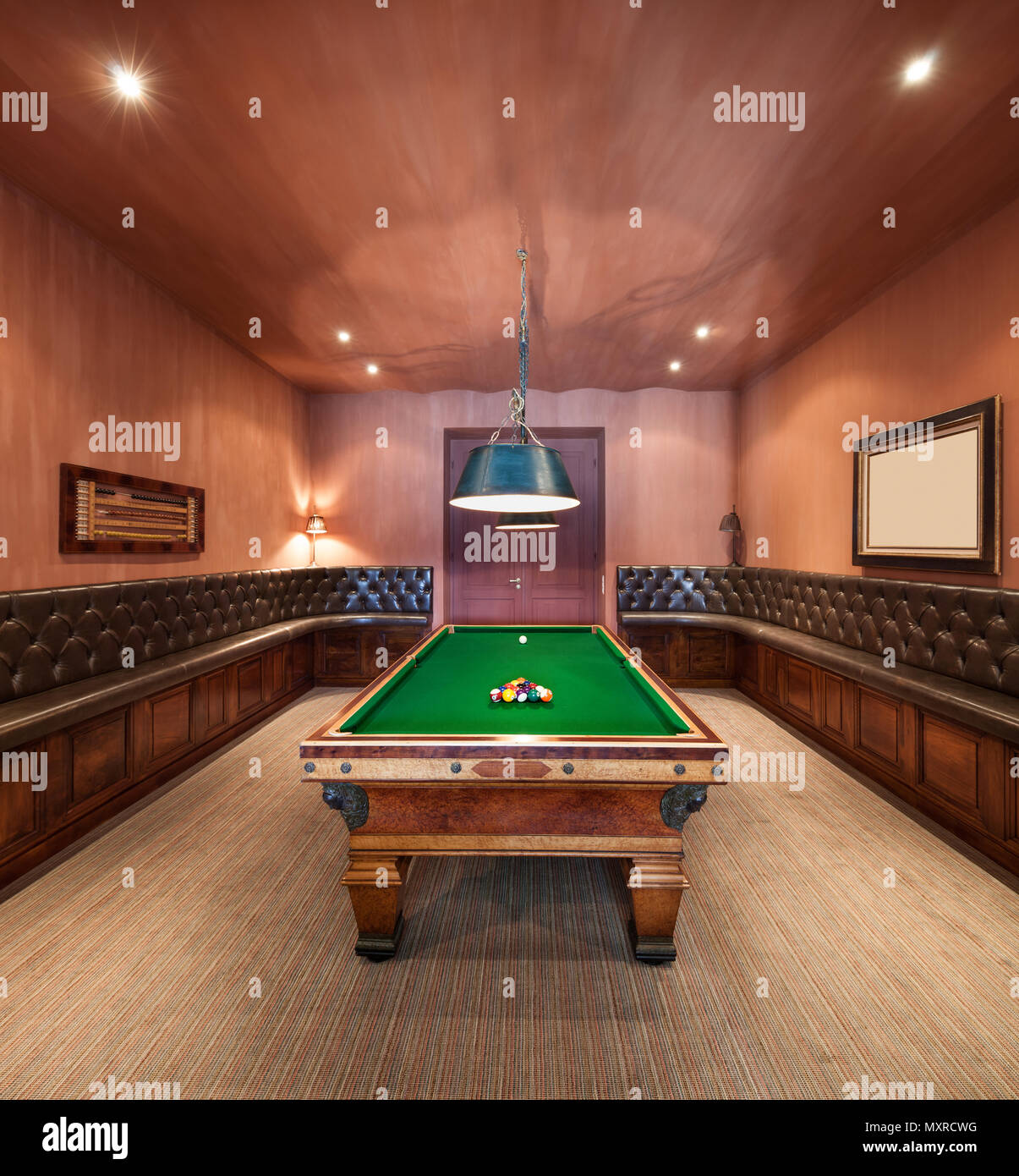 Entertainment room in luxury mansion with pool table Stock Photo - Alamy