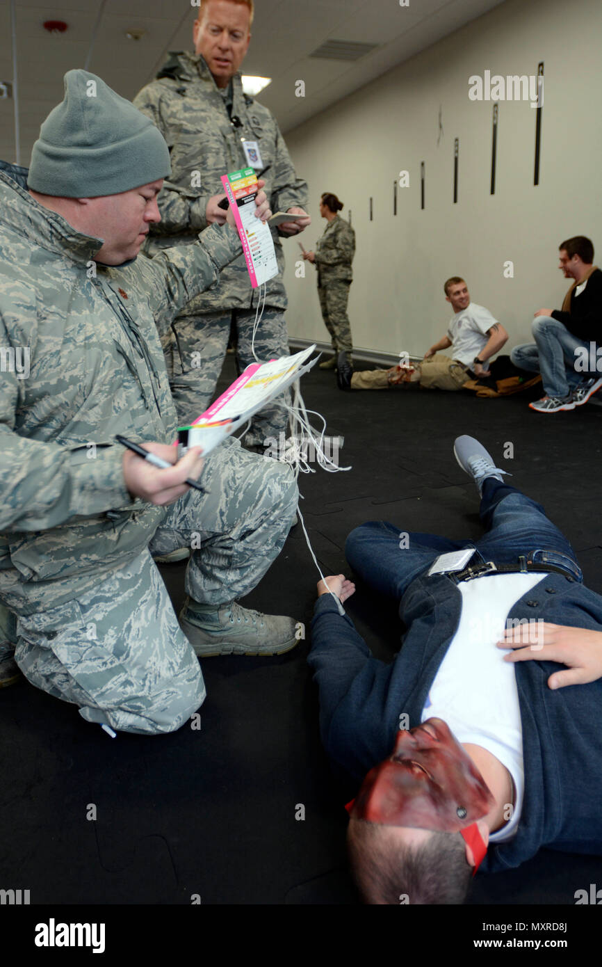 U.S. Air Force Maj. Jeffrey Wnek (left), 145th Medical Group, inspects ...