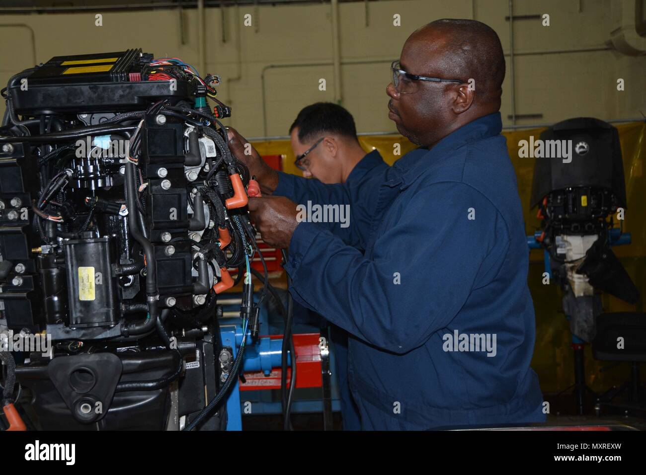 Outboard motor maintenance training hi-res stock photography and images ...