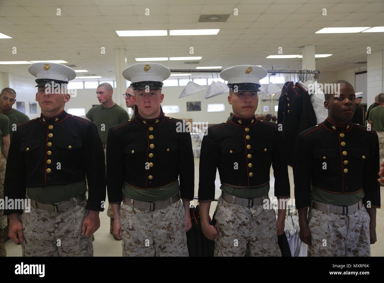 Marine recruits from Platoon 3002, Kilo Company, 3rd Battalion, line up ...