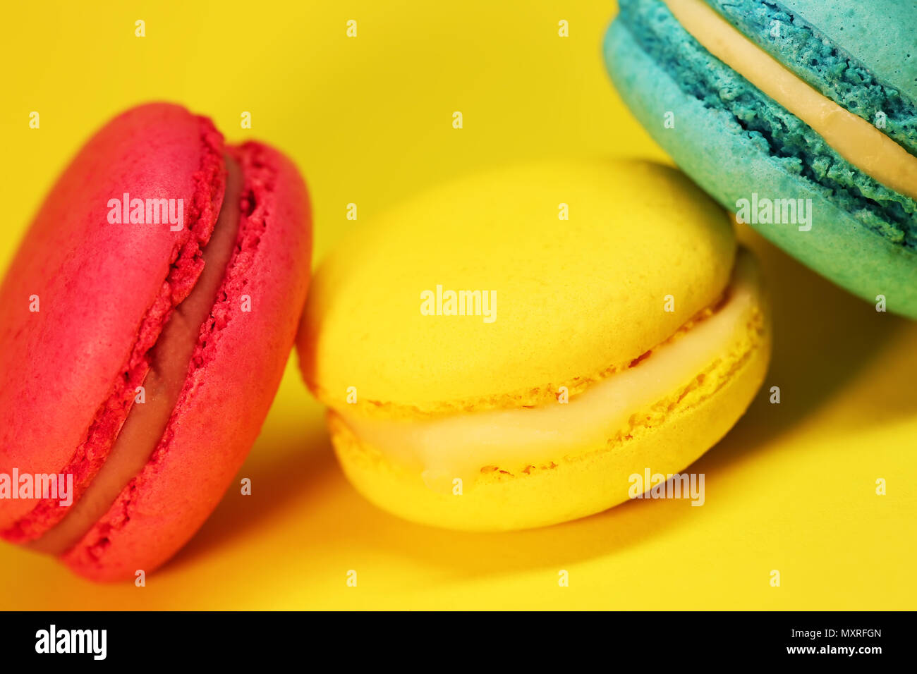 Bright food photography of macroons on yellow background Stock Photo ...