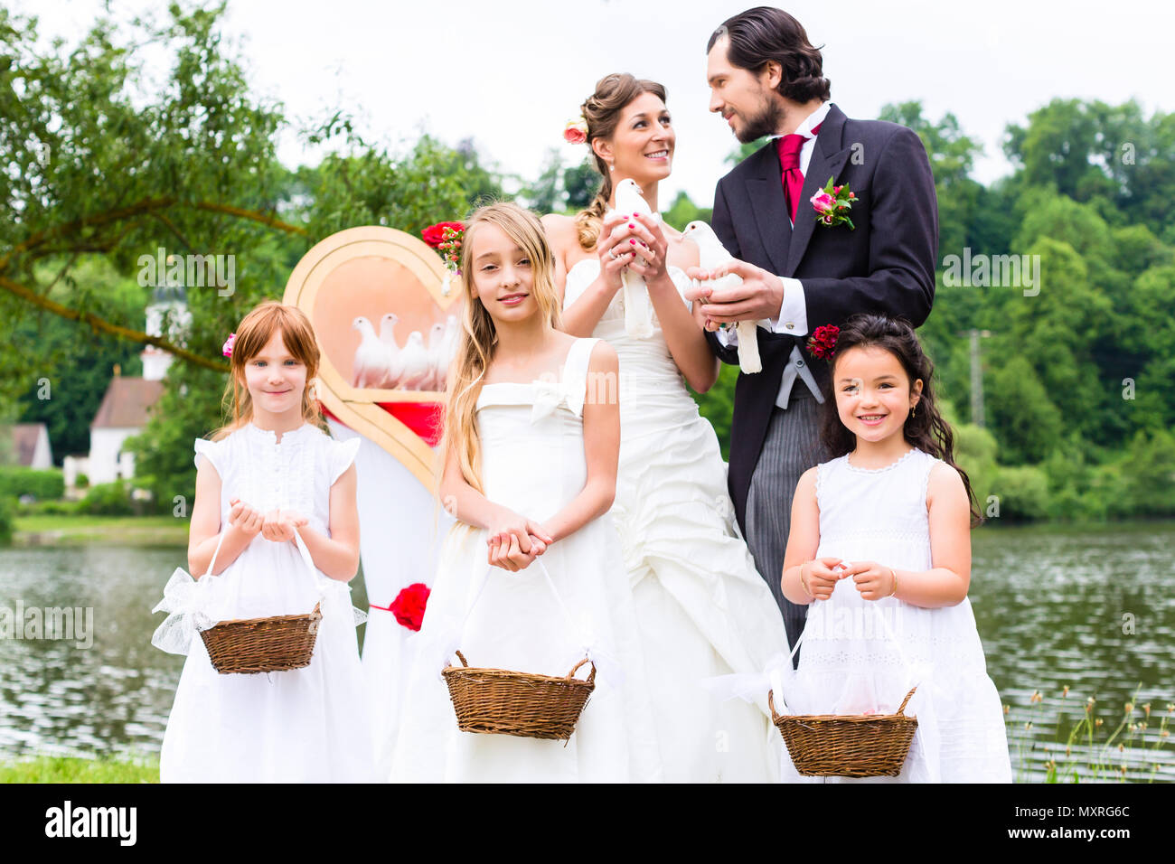 Children with doves hi-res stock photography and images - Alamy