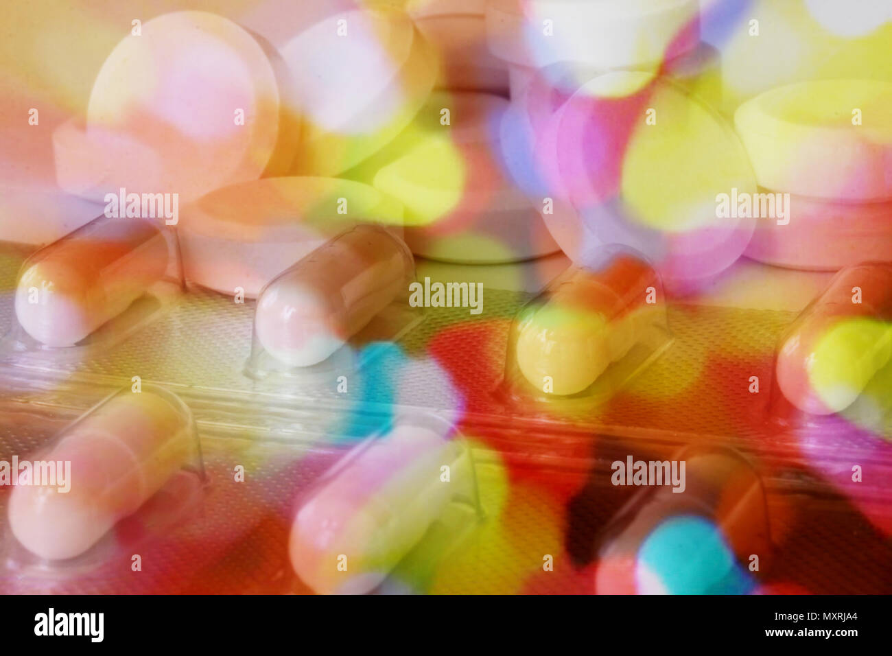 Pile of pills in color fantasy with psychedelic colors showing ...
