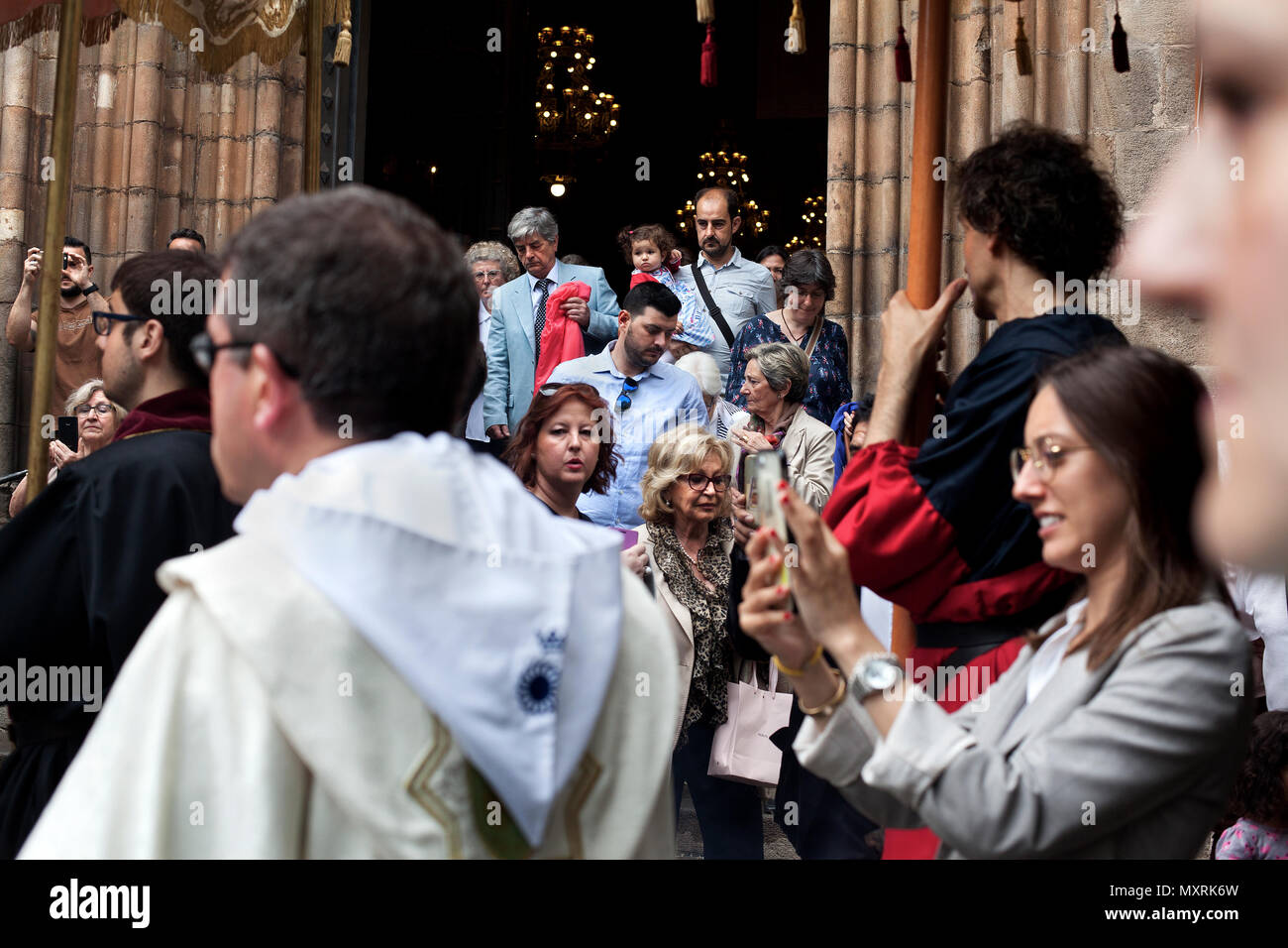 People exiting a church during a First Communion ceremony, Barcelona ...