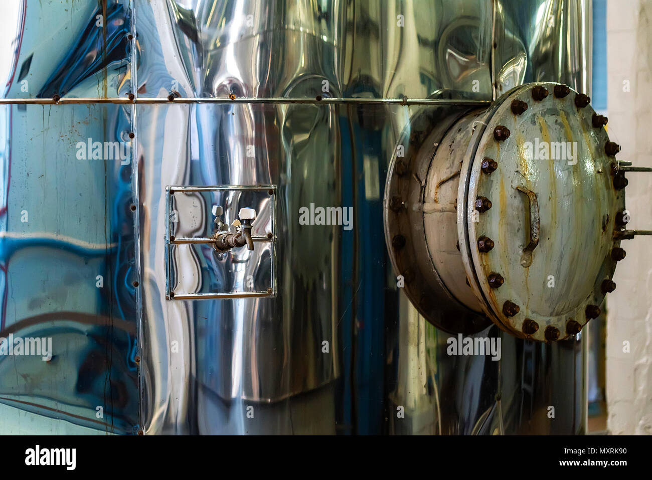 Chrome wine tanks at modern winery Stock Photo - Alamy