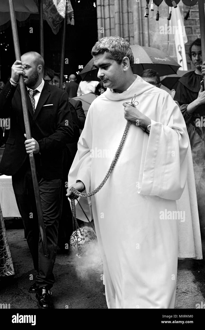 White And Black Catholic Priest