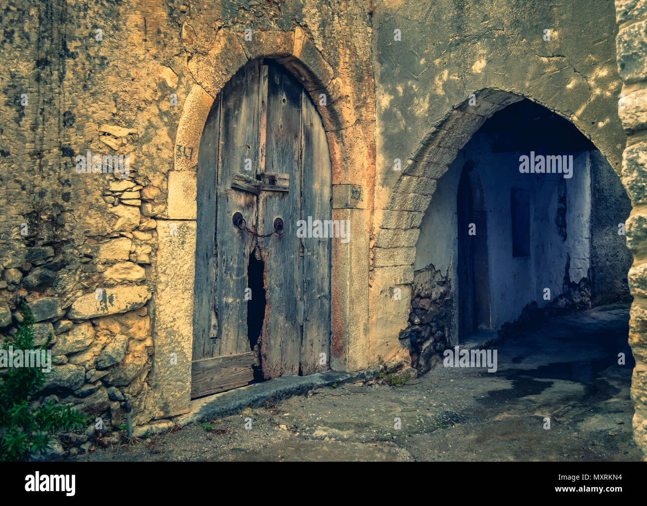 Kastelli Crete-medieval archway, old arched wooden gate, abandoned ...