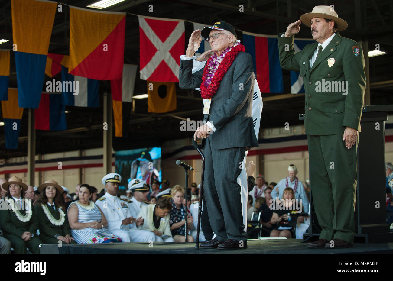 Donald Stratton, a pearl harbor survivor, renders a salute as the USS ...