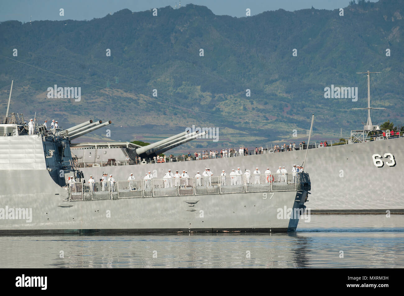 Sailors assigned to the USS Halsey (DDG 97) perform a Pass-in-Review ...