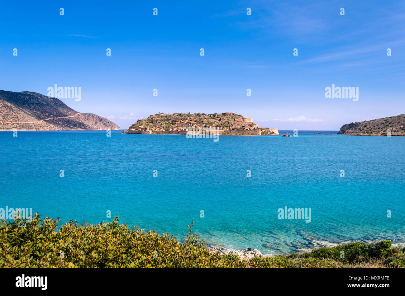 The island of Spinalonga is located in the Gulf of Elounda in north ...