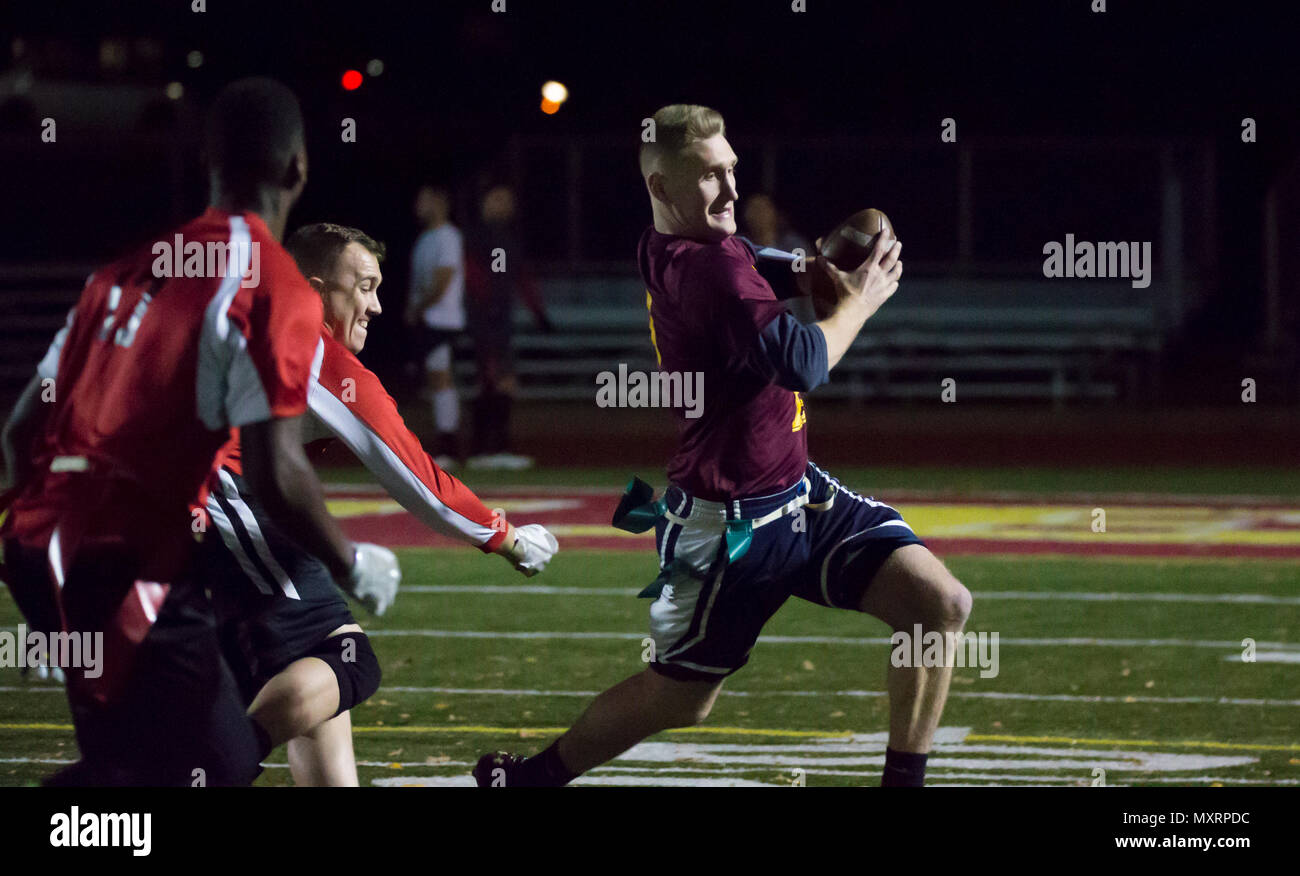 A U.S. Marine with the Marine Corps University flag football team ...