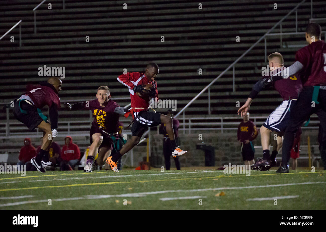 A U.S. Marine with the Base Motor Transport flag football team attempts ...