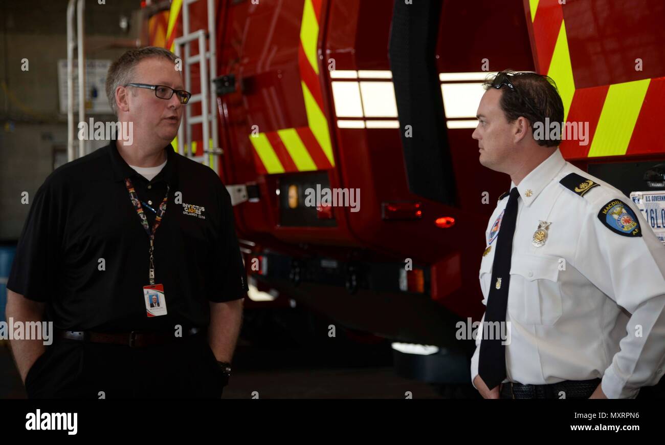 Richard Collins, left, the Sarasota County Emergency Services ...