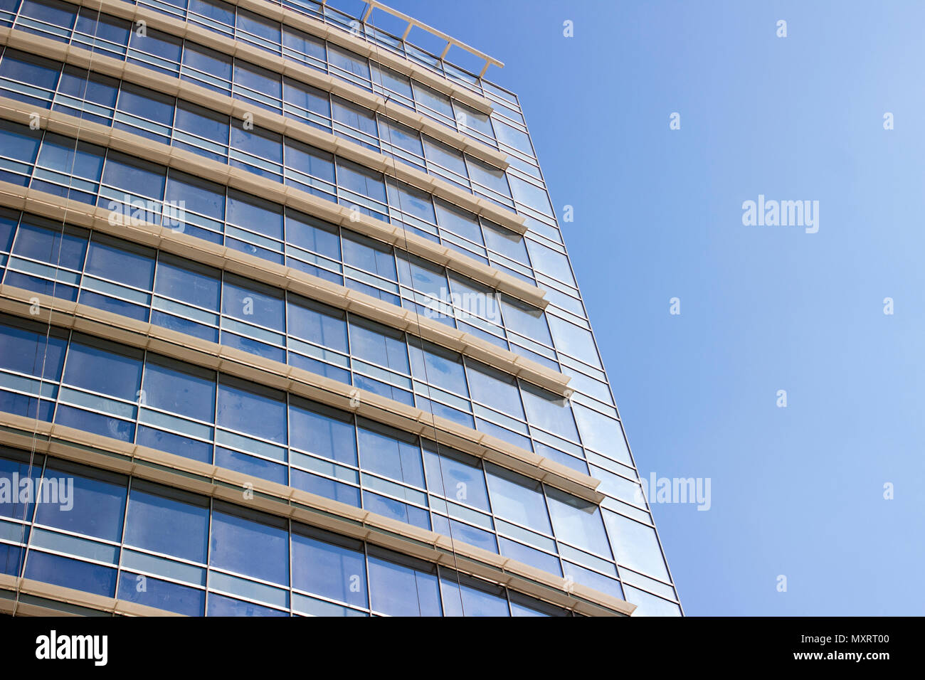 Side view of a corporate glass window wall with mini overhangs Stock ...