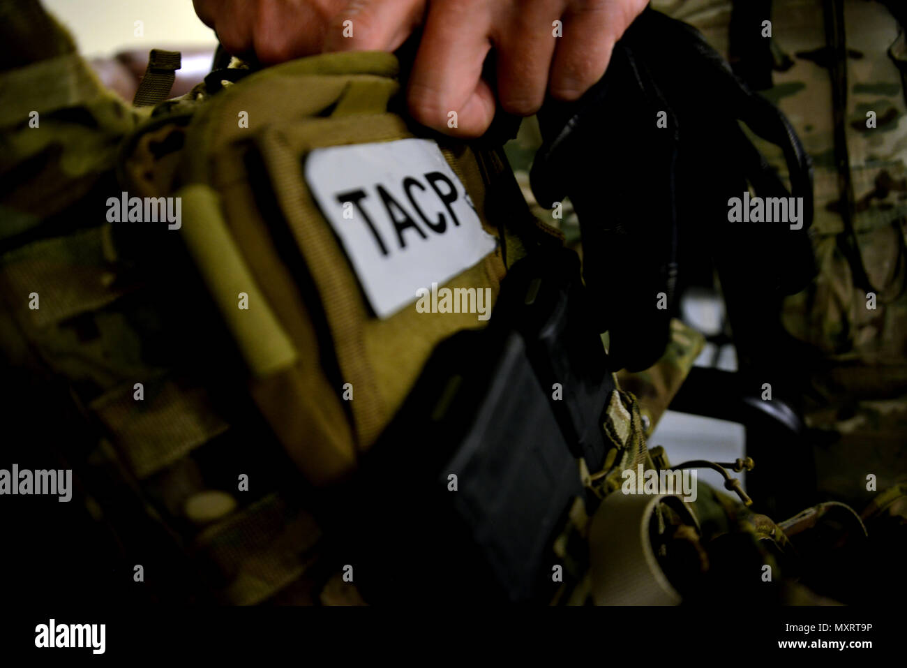 A Tactical Air Control Party Airman assigned to the 165th Air Support ...