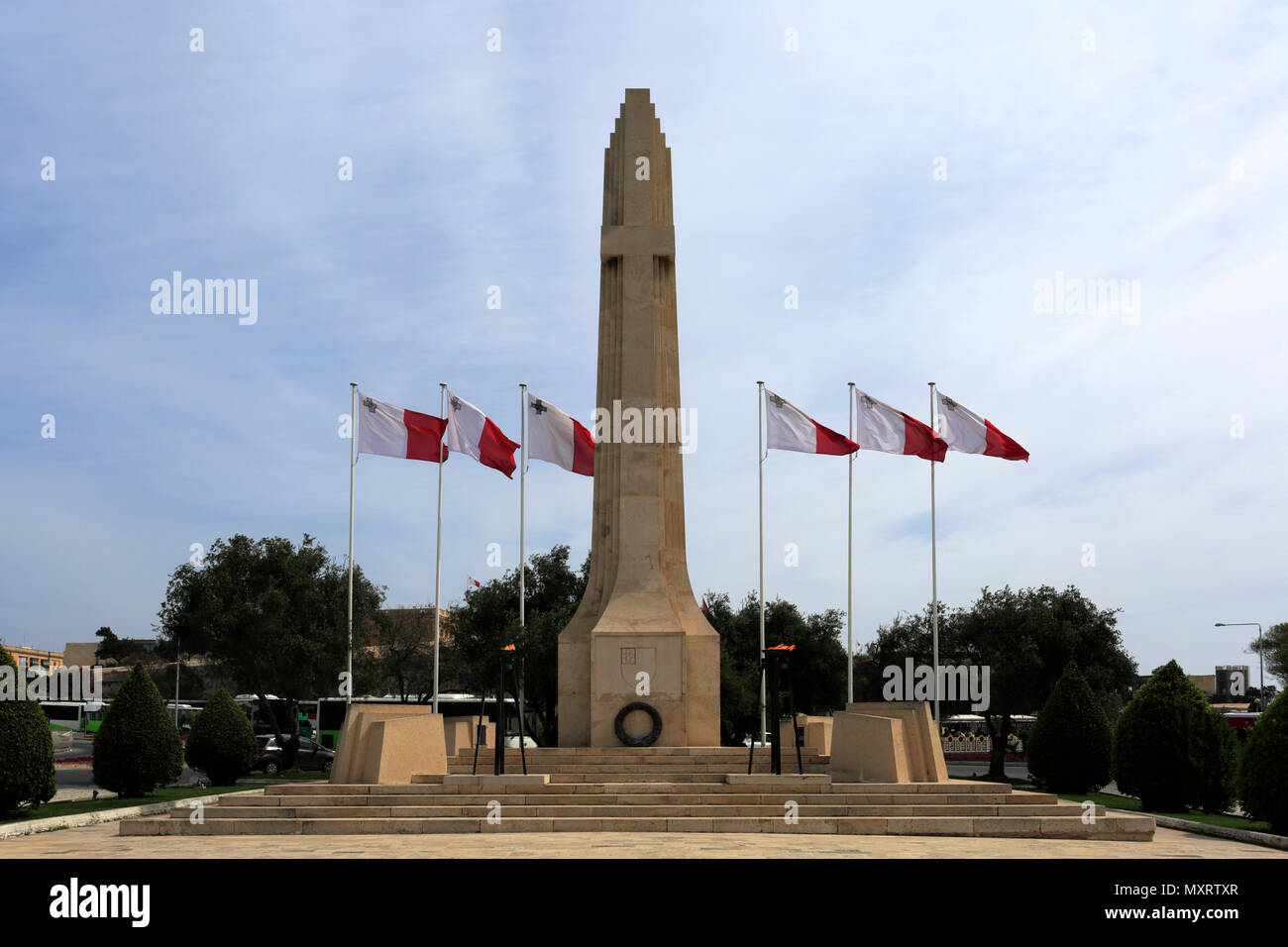 Maltese flags flying over the war memorial, Floriana, Valletta city ...
