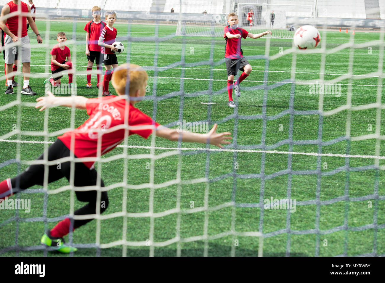 Junior football goalkeeper hi-res stock photography and images - Alamy