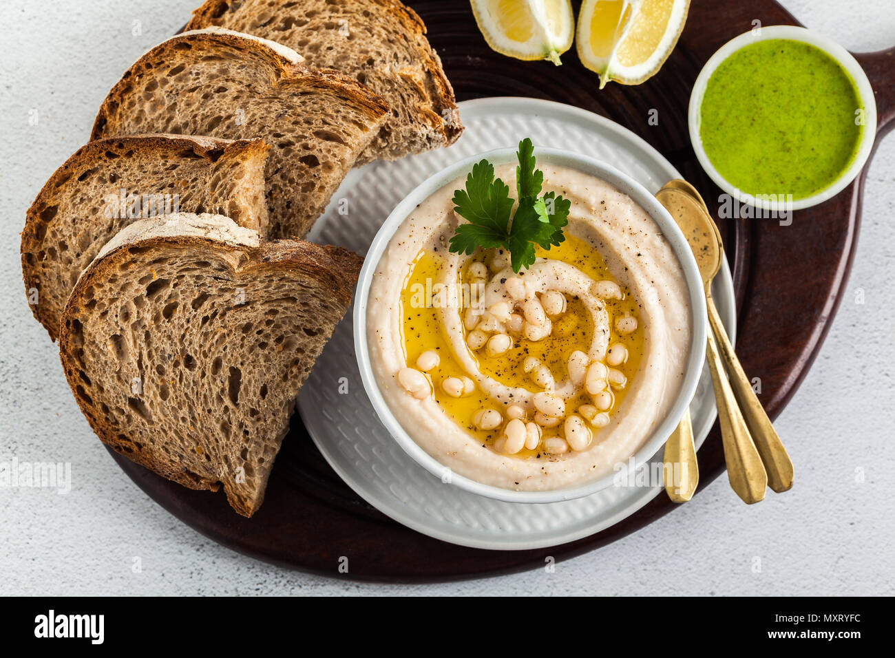 hummus of white cannellini beans, served with arugula pesto and rye ...