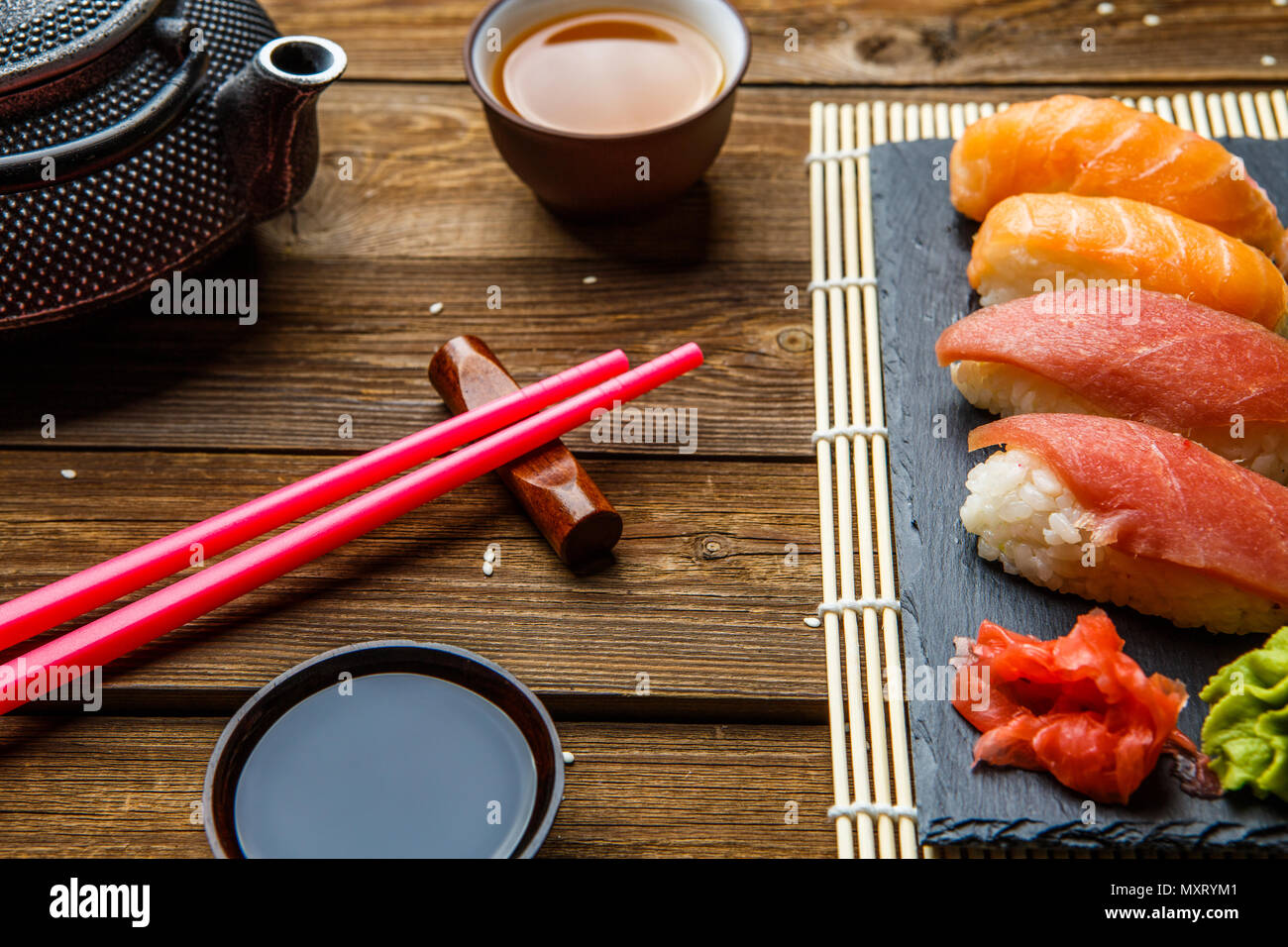 Photography of sushi, red sticks Stock Photo - Alamy