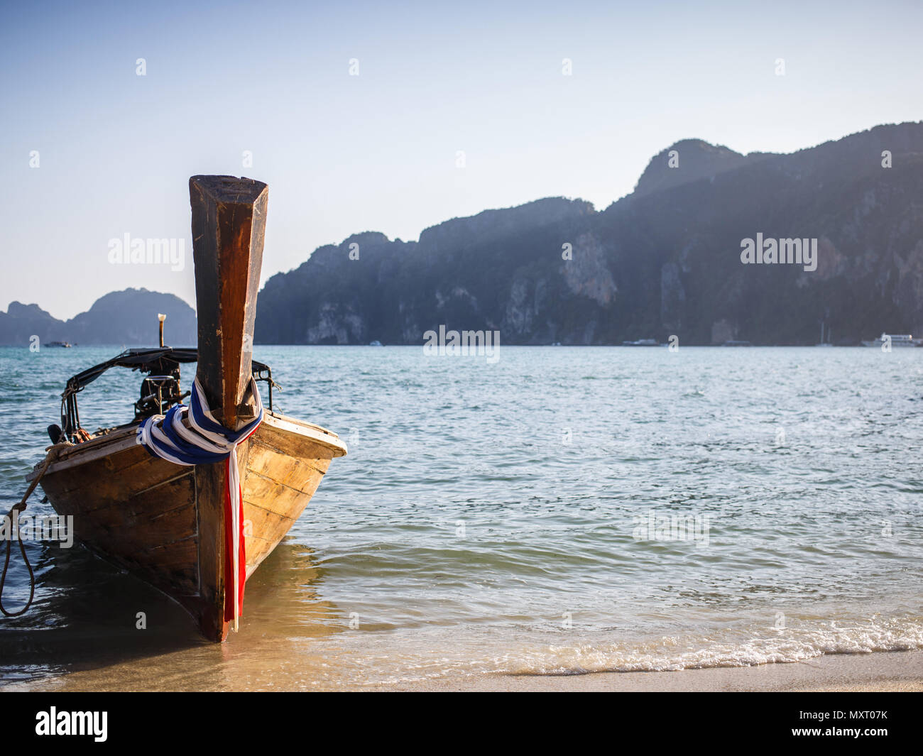 Long boat and tropical beach Stock Photo - Alamy